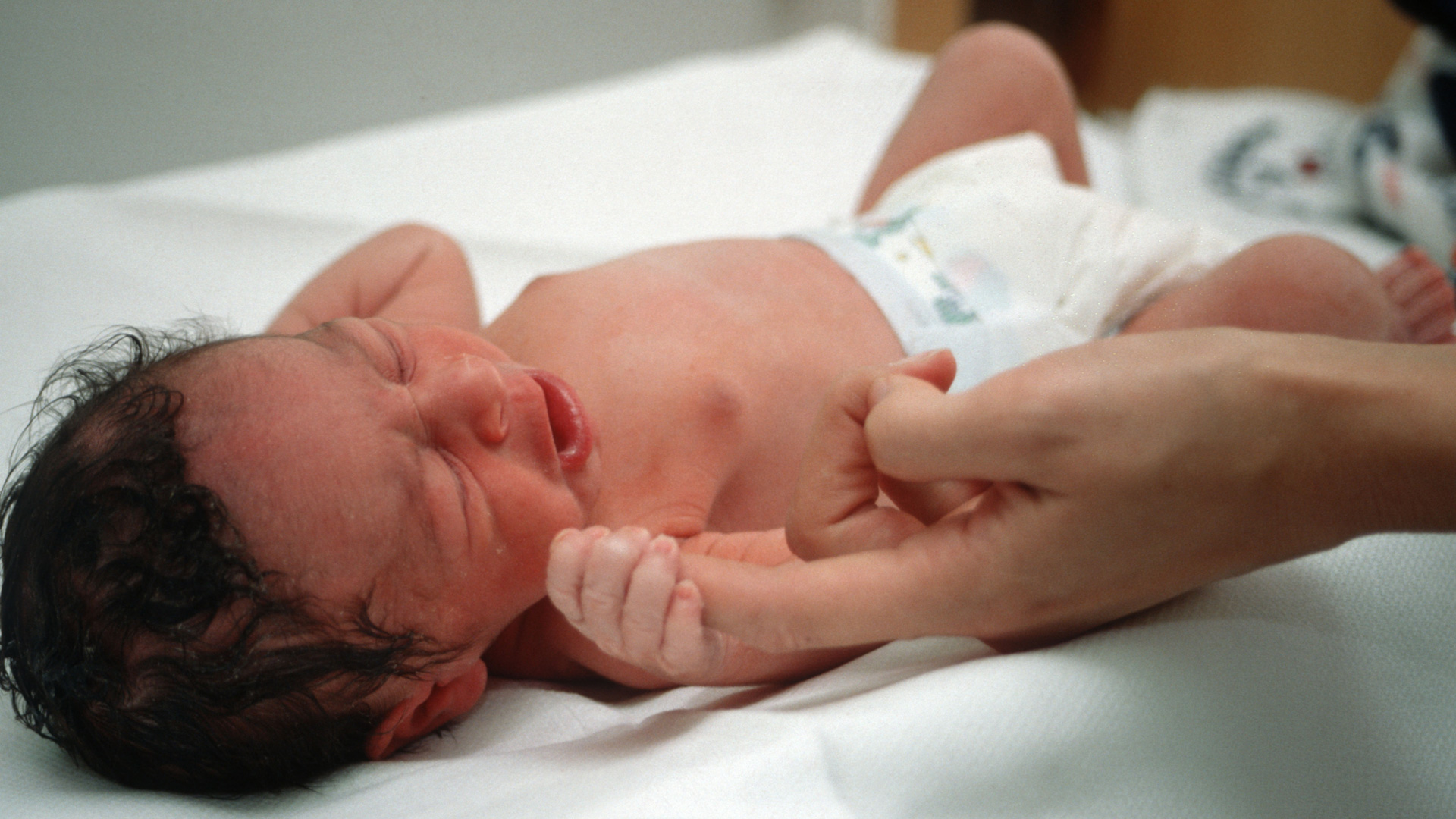 What is the Apgar score for newborns and what do the scores mean